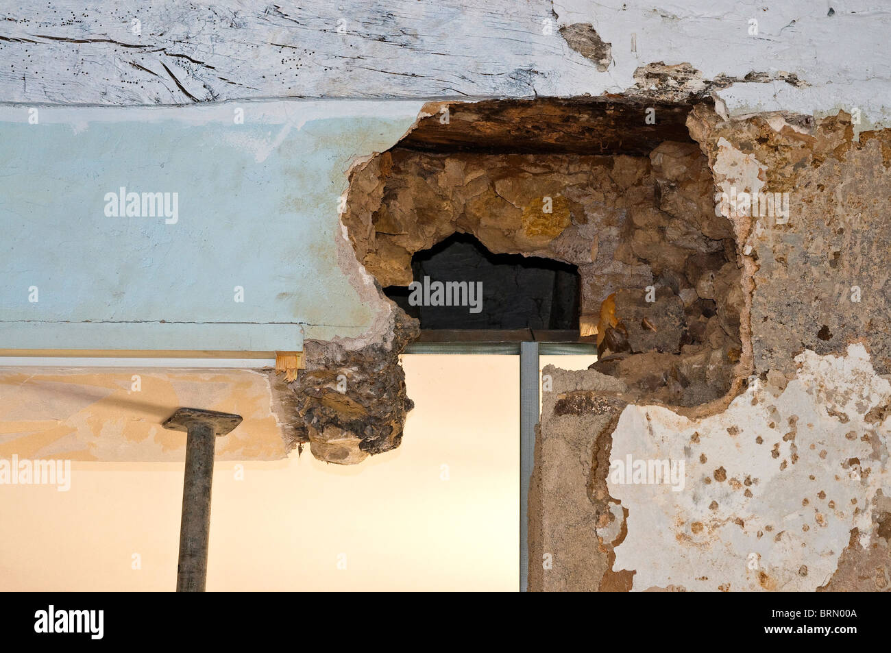 Rotten supporting beam cut away revealing dry rot - France Stock Photo ...