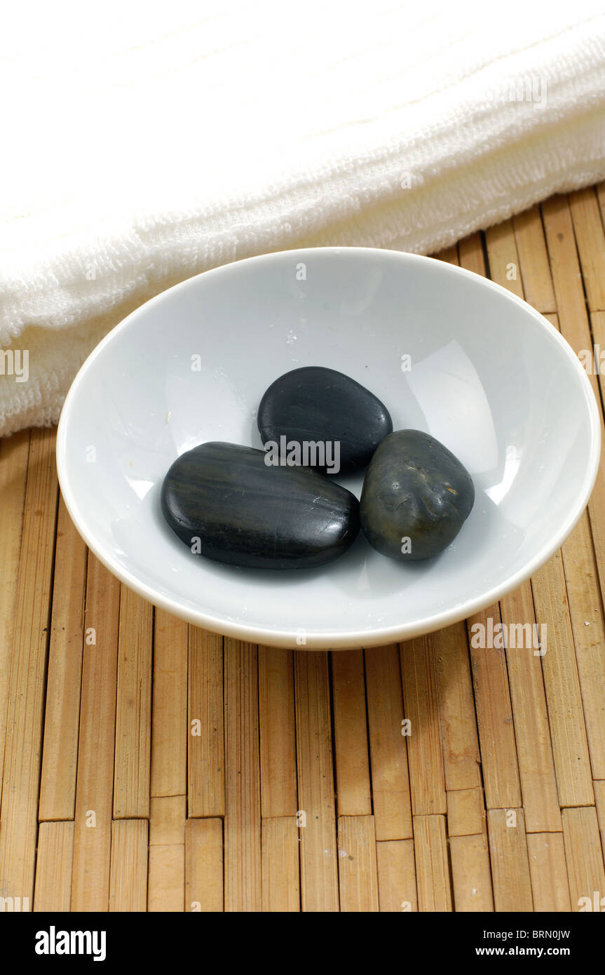 Close-up of pebbles in a bowl Stock Photo - Alamy
