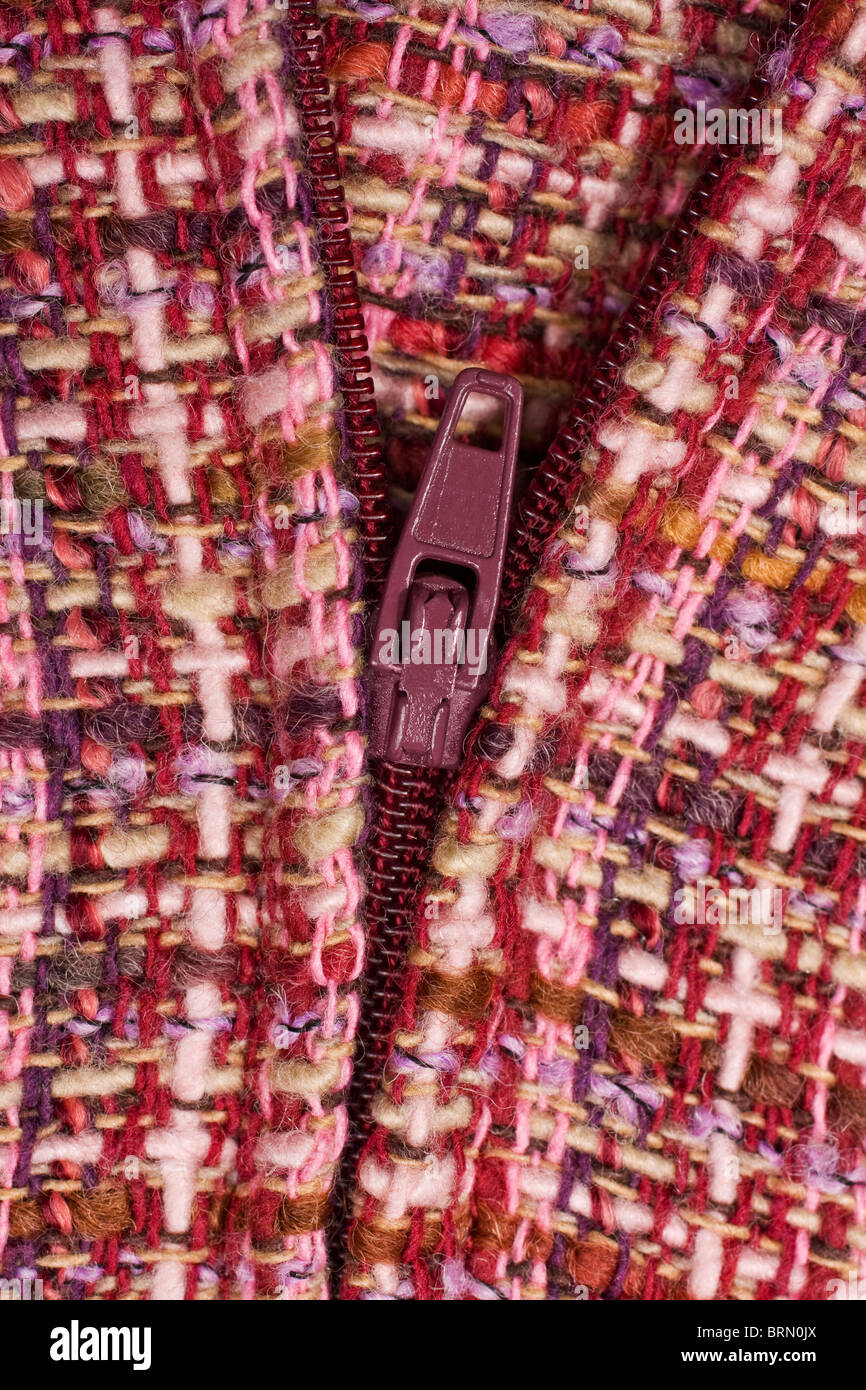 Close up of a purple textile cloth and zipper Stock Photo - Alamy