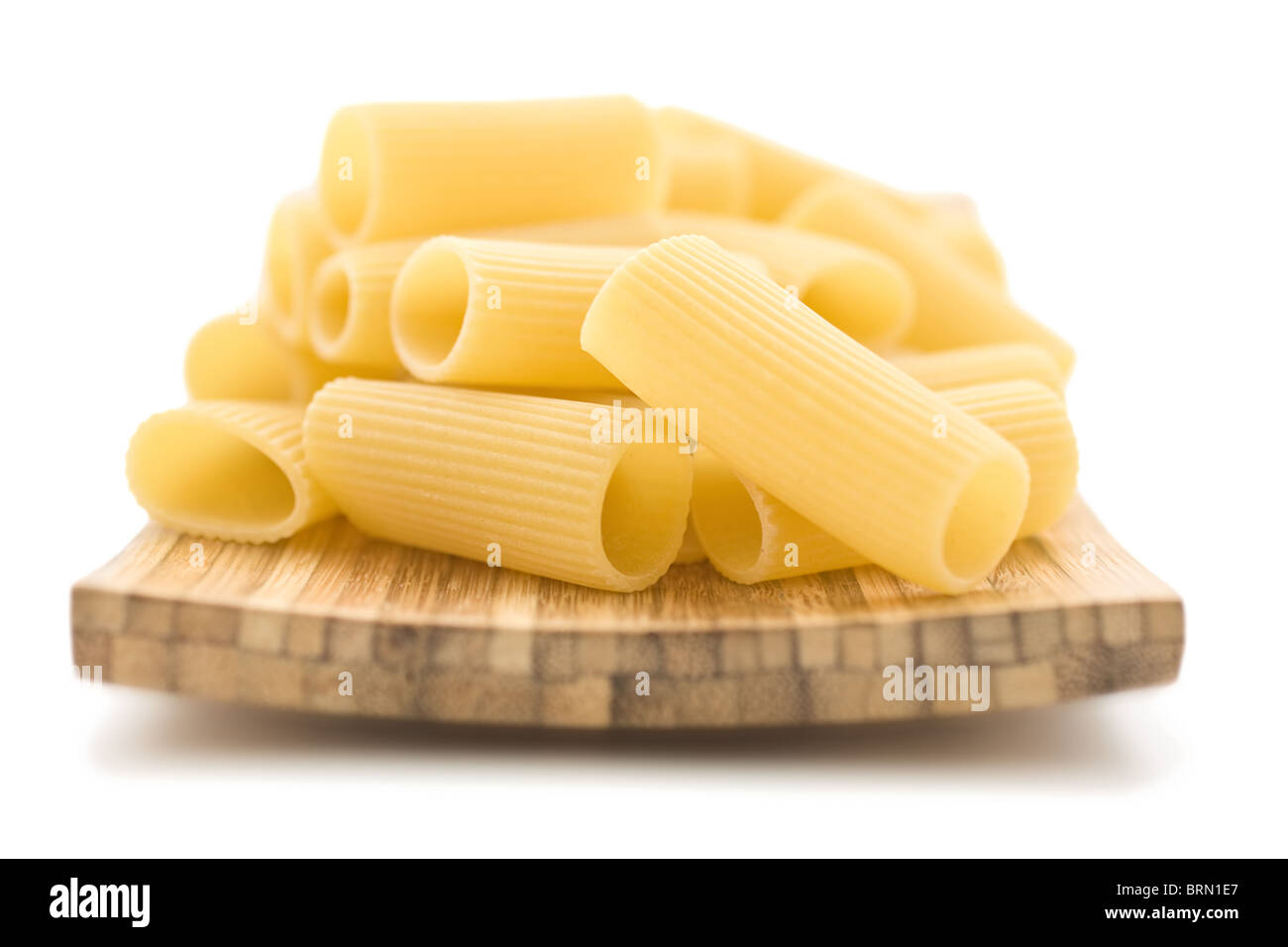 Italian raw pasta isolated on white background Stock Photo - Alamy