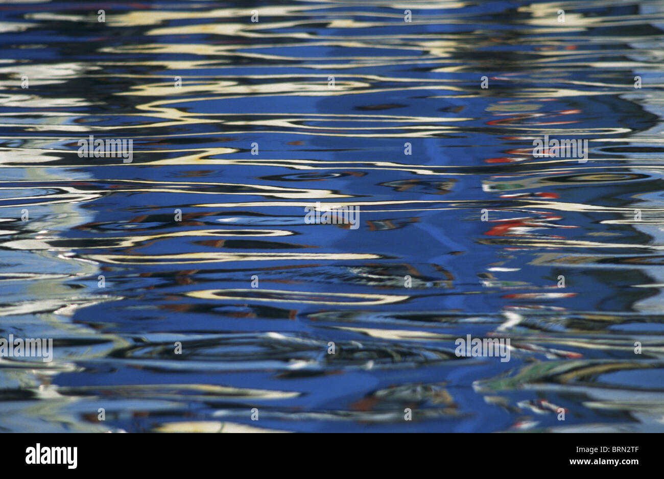 Ripples of water reflecting the light Stock Photo - Alamy