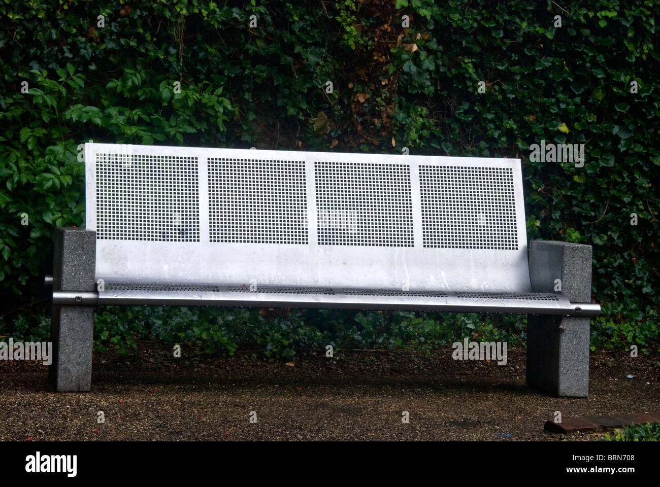 Metal public bench Stock Photo - Alamy