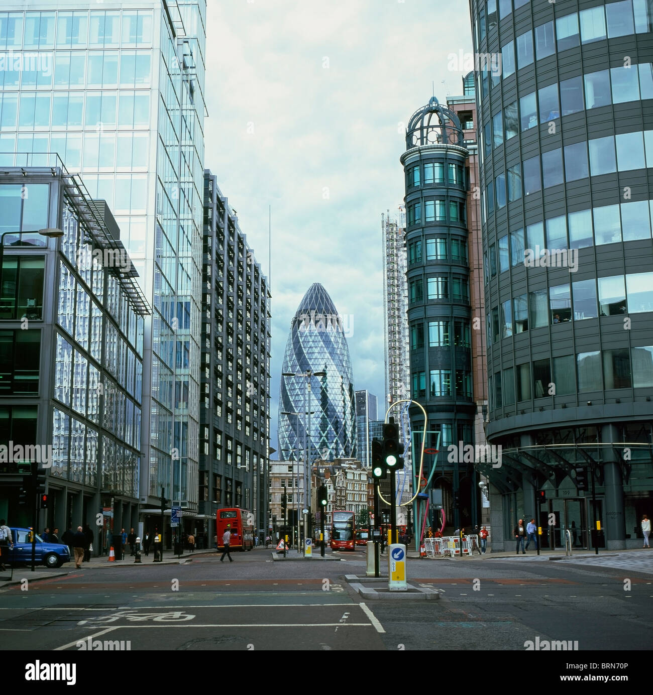 View of Bishopsgate and Norman Foster gherkin building with a red 135 ...