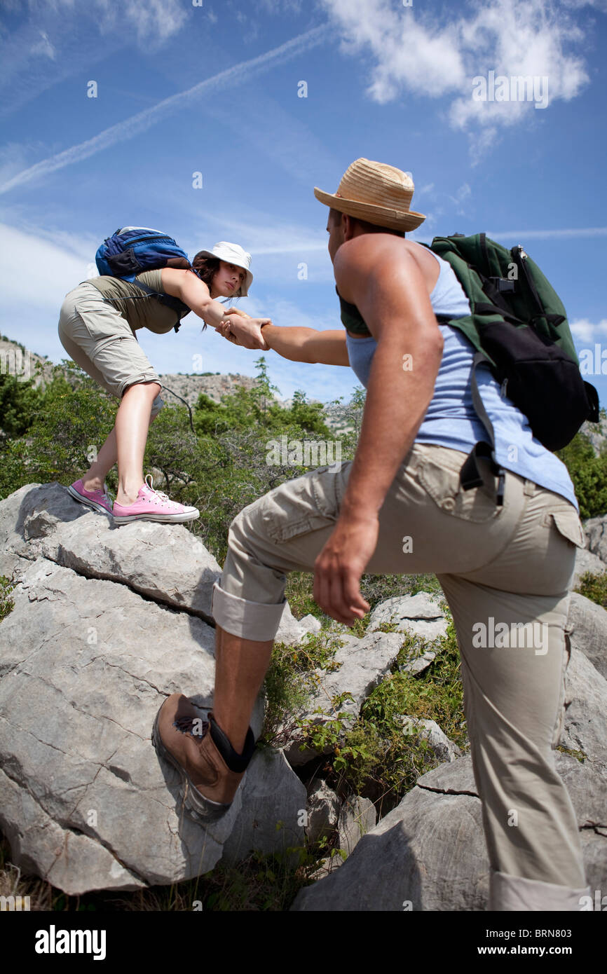 Helping Each Other (man And Woman) High Resolution Stock Photography ...