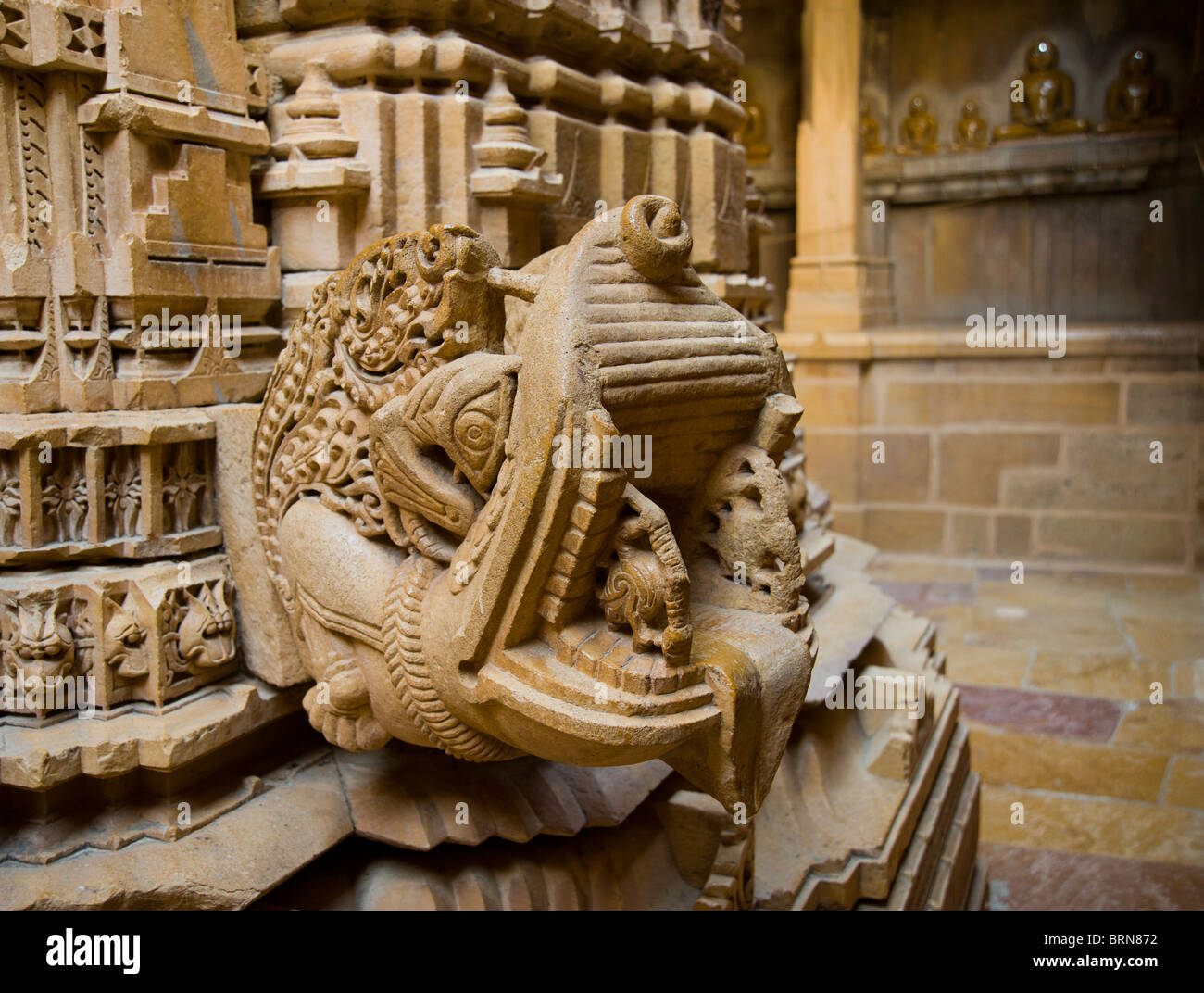 Ornate stone carving inside the Jain temple showing many species in one ...