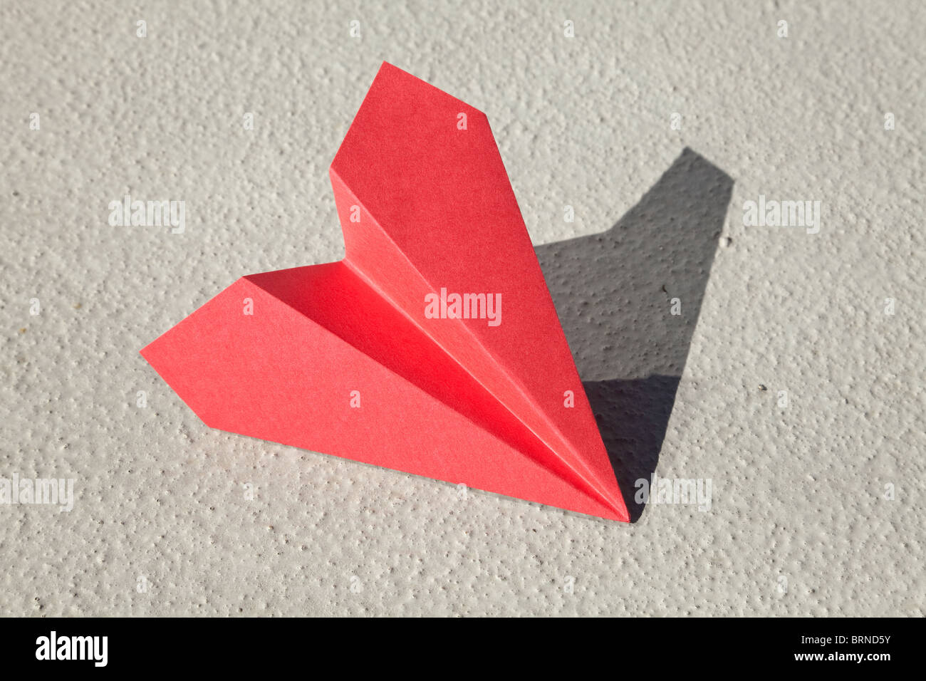 Red Paper Airplane close up Stock Photo - Alamy