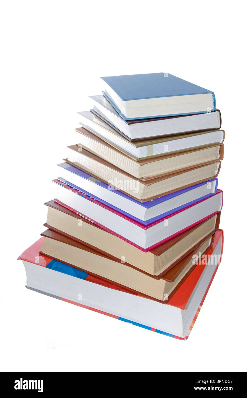 A lot of books, tower made of books against a white background Stock ...