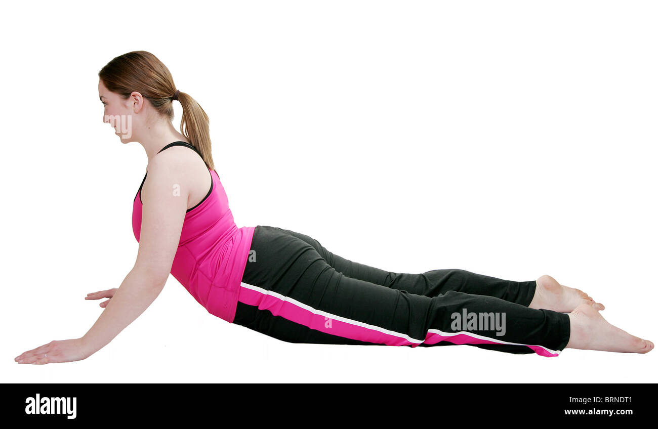 young woman doing yoga and stretching exercise isolated on white Stock ...