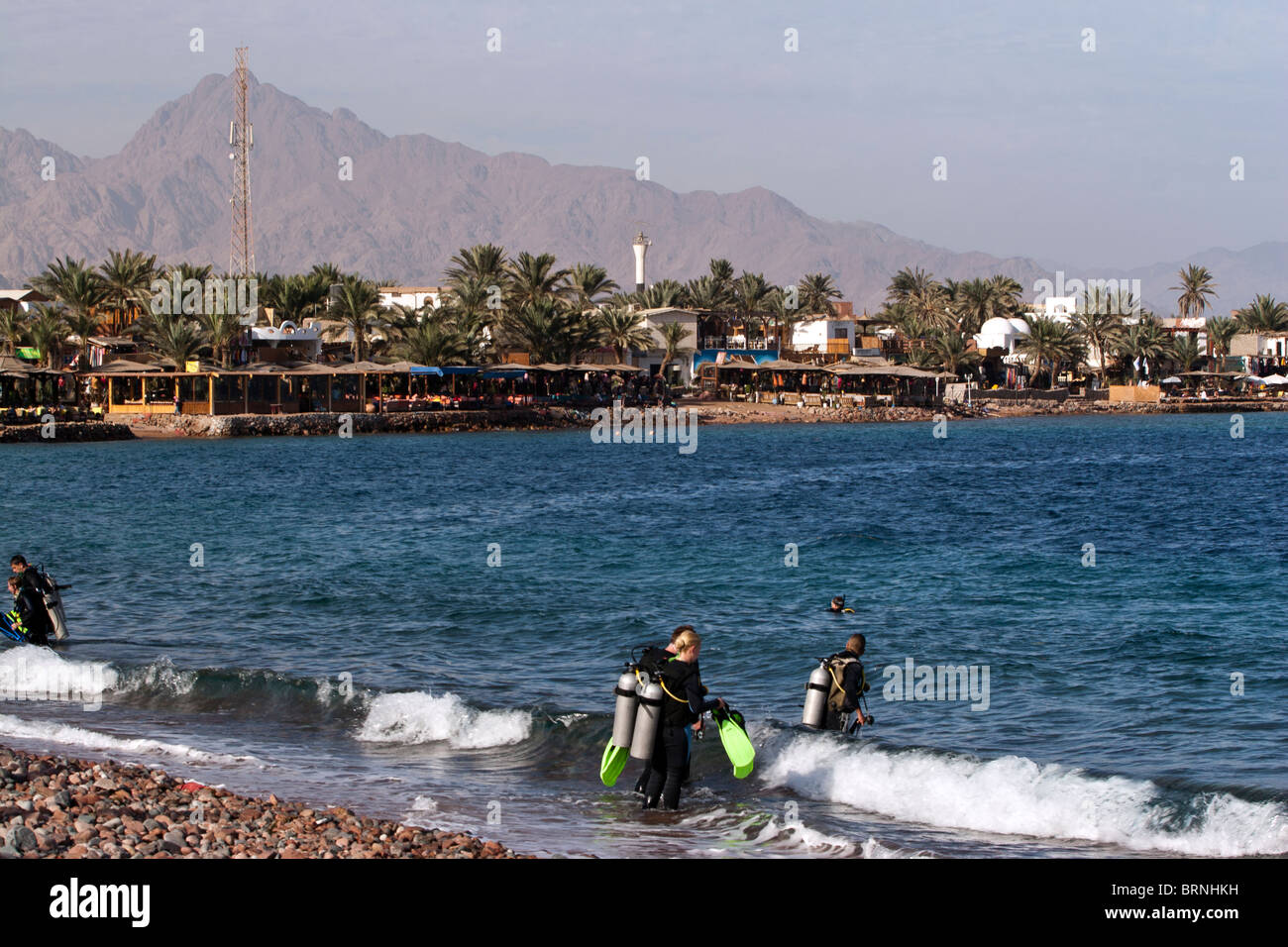 Divers entering the water at Dahab, Egypt Stock Photo - Alamy