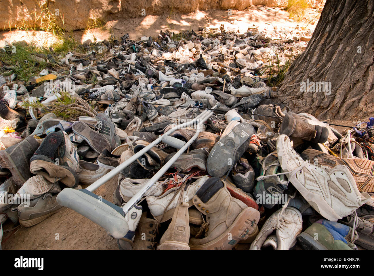 Crutch and shoes below roadside shoe tree, Churchill County miilepost ...