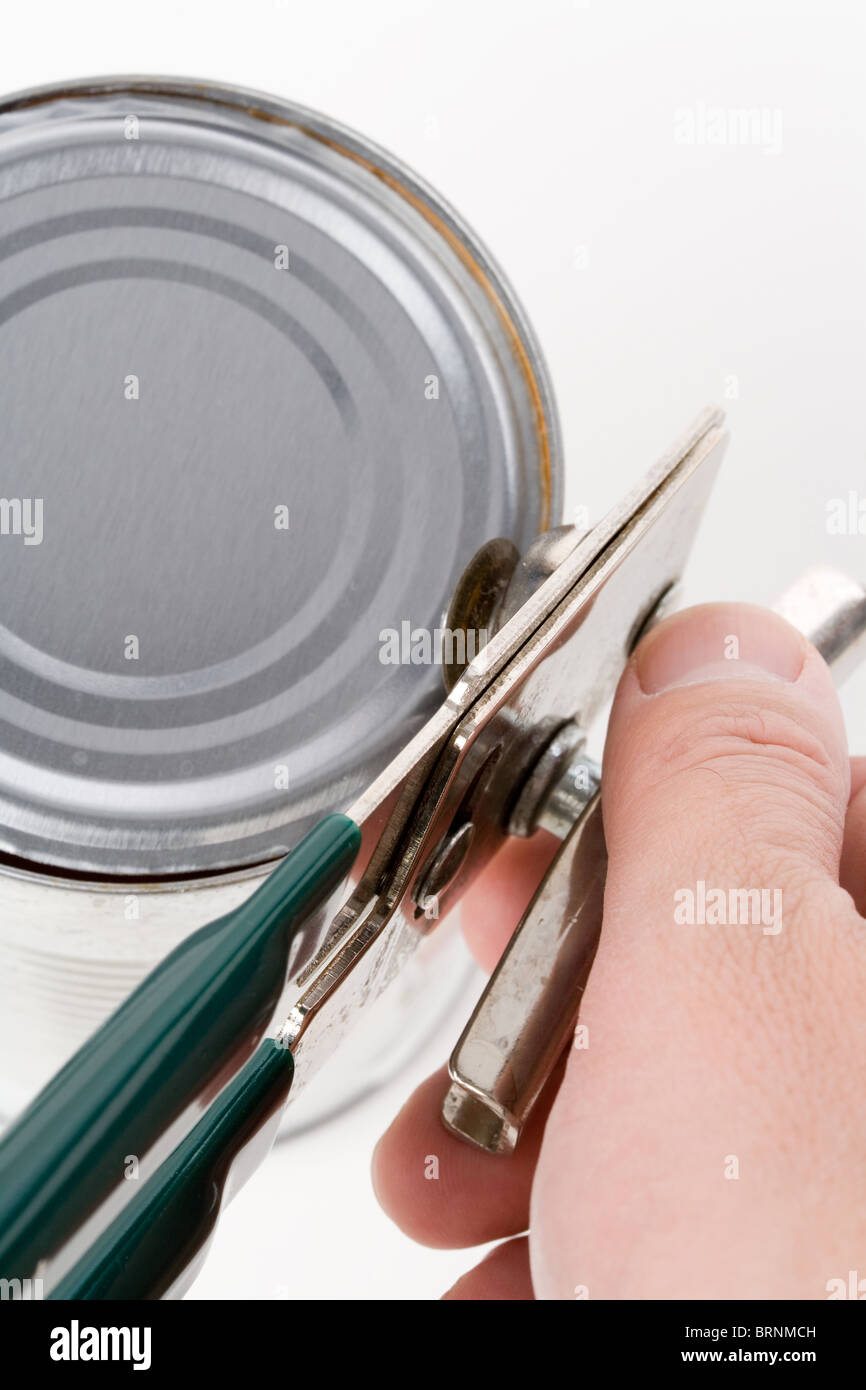 Hand tin opener opening can hi-res stock photography and images - Alamy