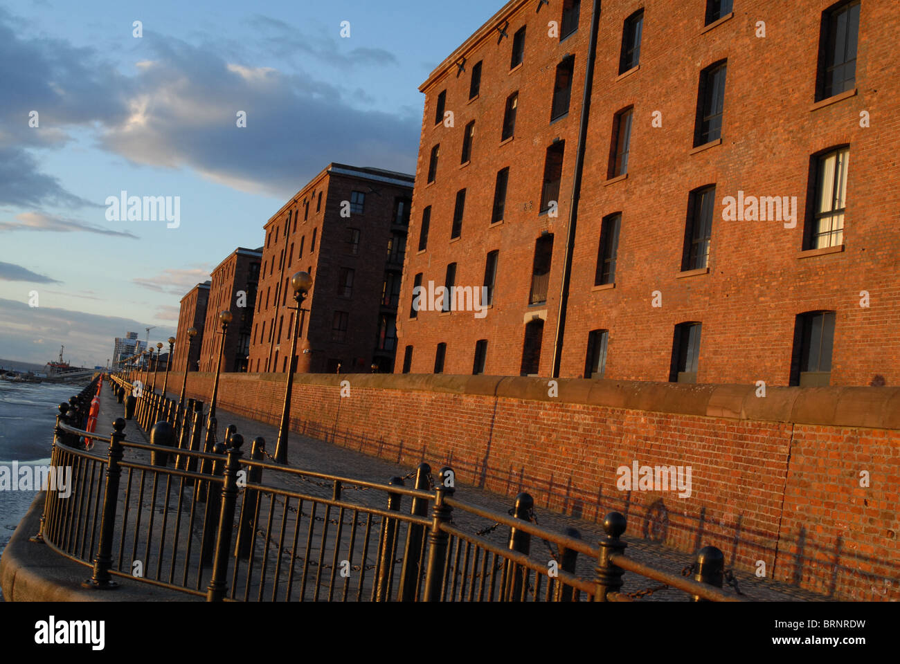 Dock wall and promenade along the River Mersey and the Albert Dock ...
