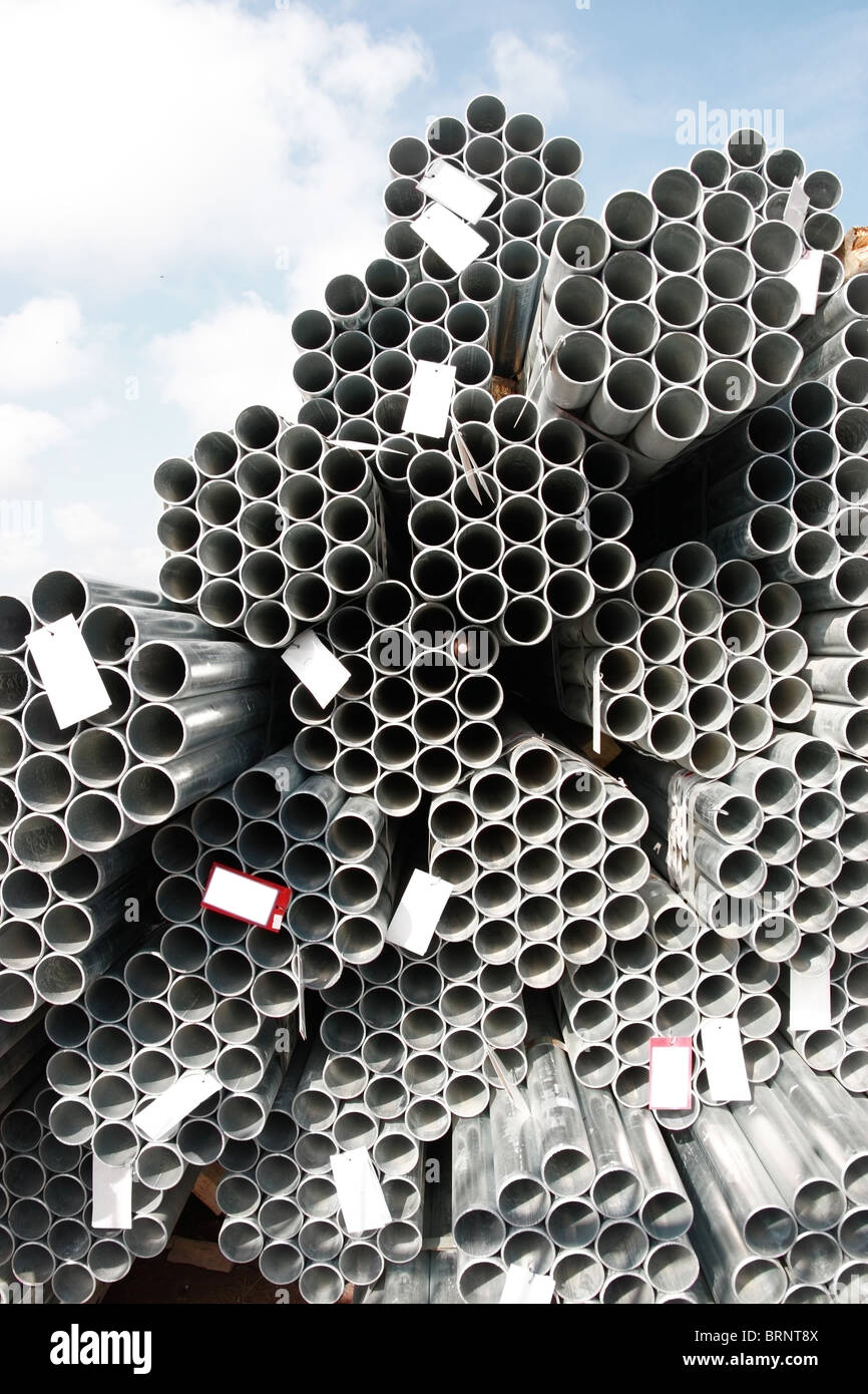 steel pipes on a dock in youghal ireland Stock Photo - Alamy