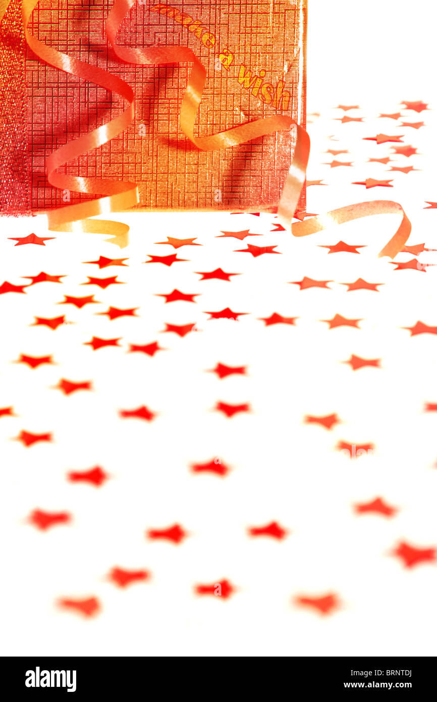 Gift box with stars against white background Stock Photo - Alamy