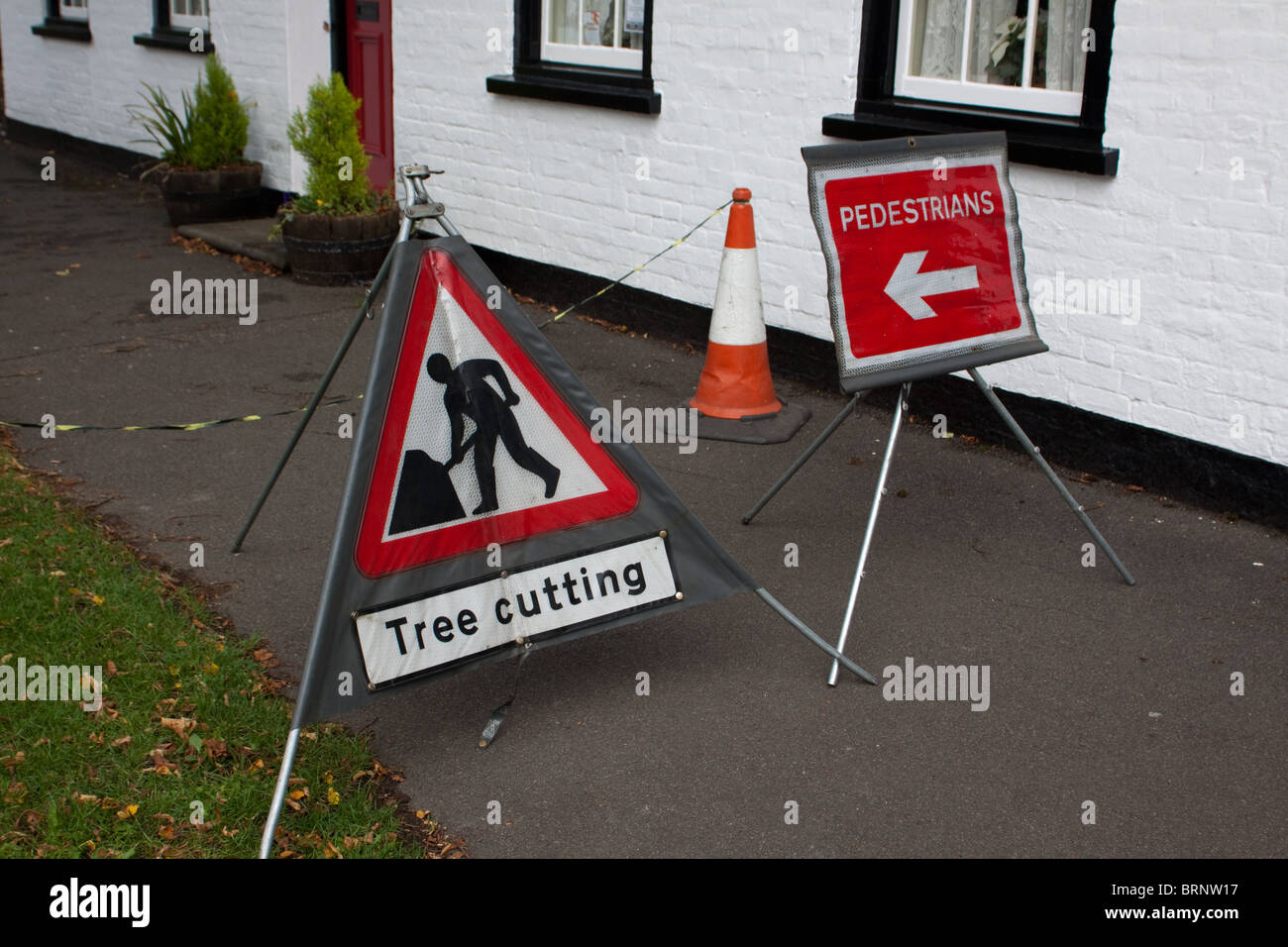 Tree cutting sign Stock Photo - Alamy