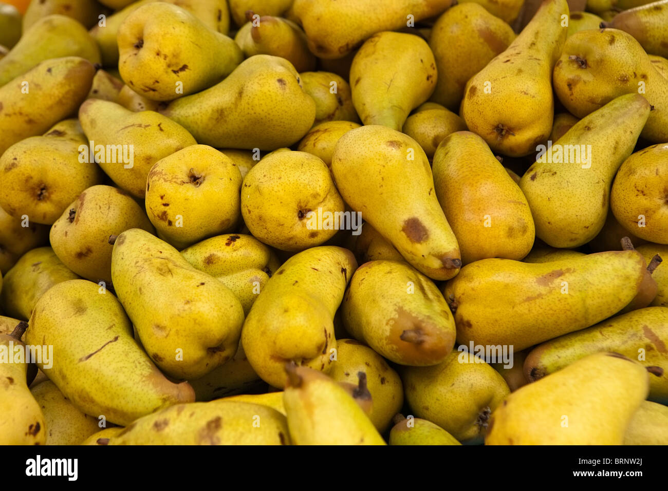 yellow pears on the market closeup Stock Photo - Alamy