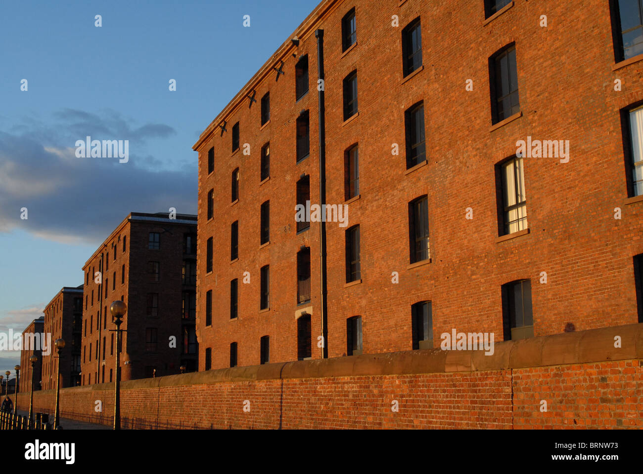 Dock wall and promenade along the River Mersey and the Albert Dock ...