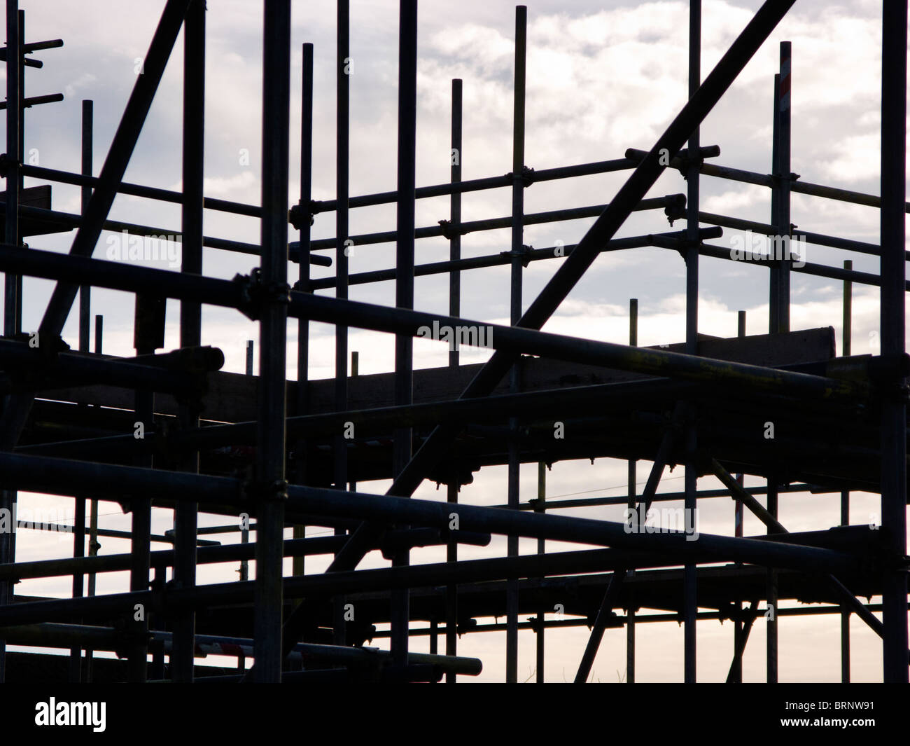 scaffolding againts a blue sky ready to build Stock Photo - Alamy
