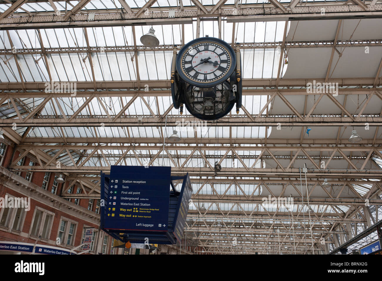Station clock, and information board, Waterloo Station, London Stock ...