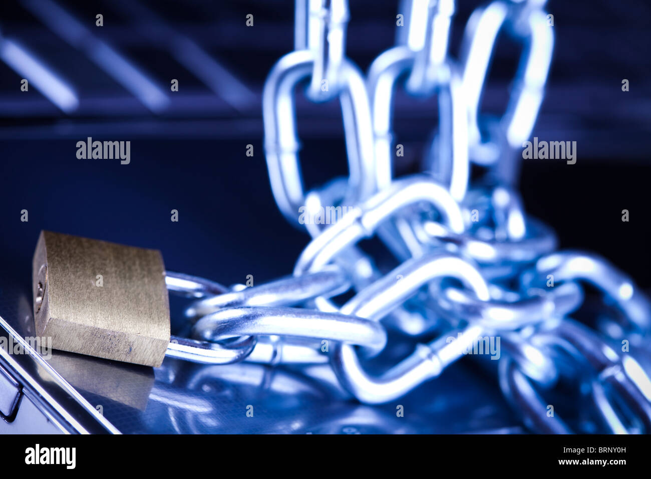 Padlock and notebook computer Stock Photo - Alamy