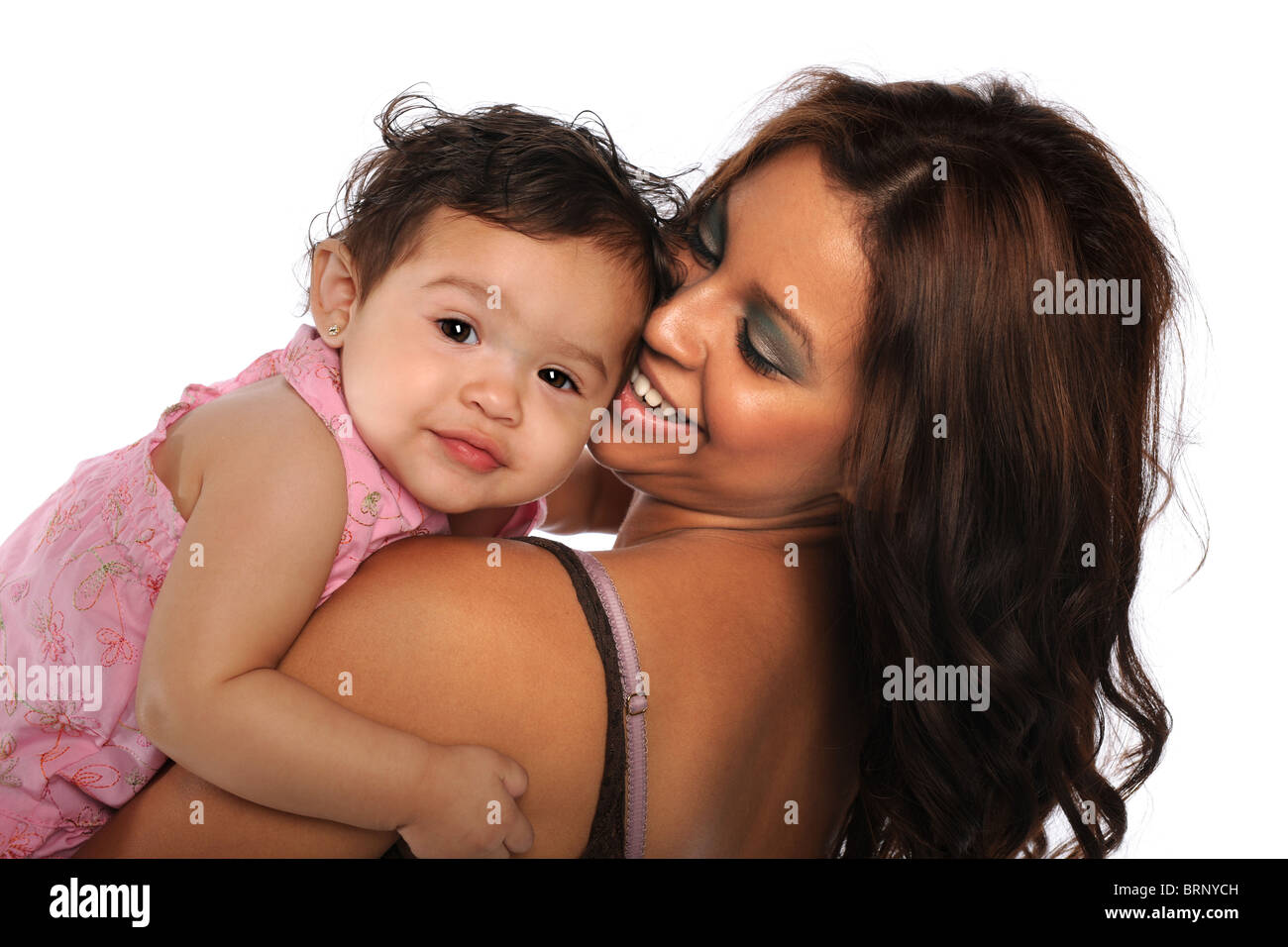Hispanic mother and daughter smiling isolated over white background ...