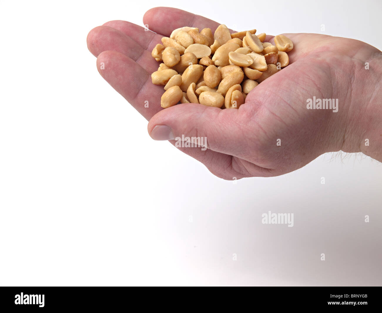 Peanuts hand hi-res stock photography and images - Alamy