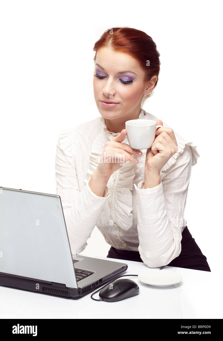 Business woman working on her laptop and drinking coffee Stock Photo ...