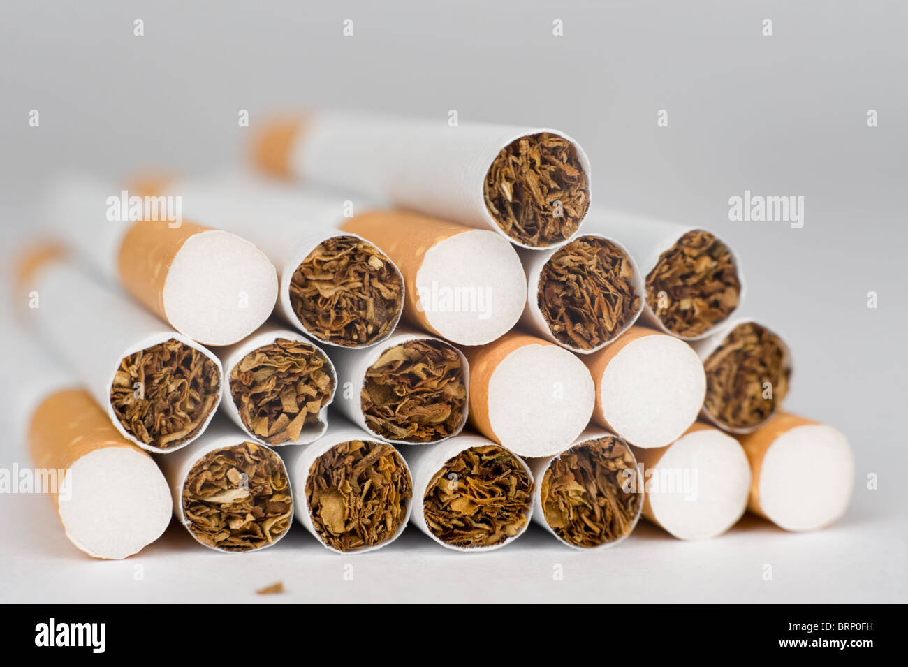 a heap of filter tipped cigarettes, macro Stock Photo - Alamy