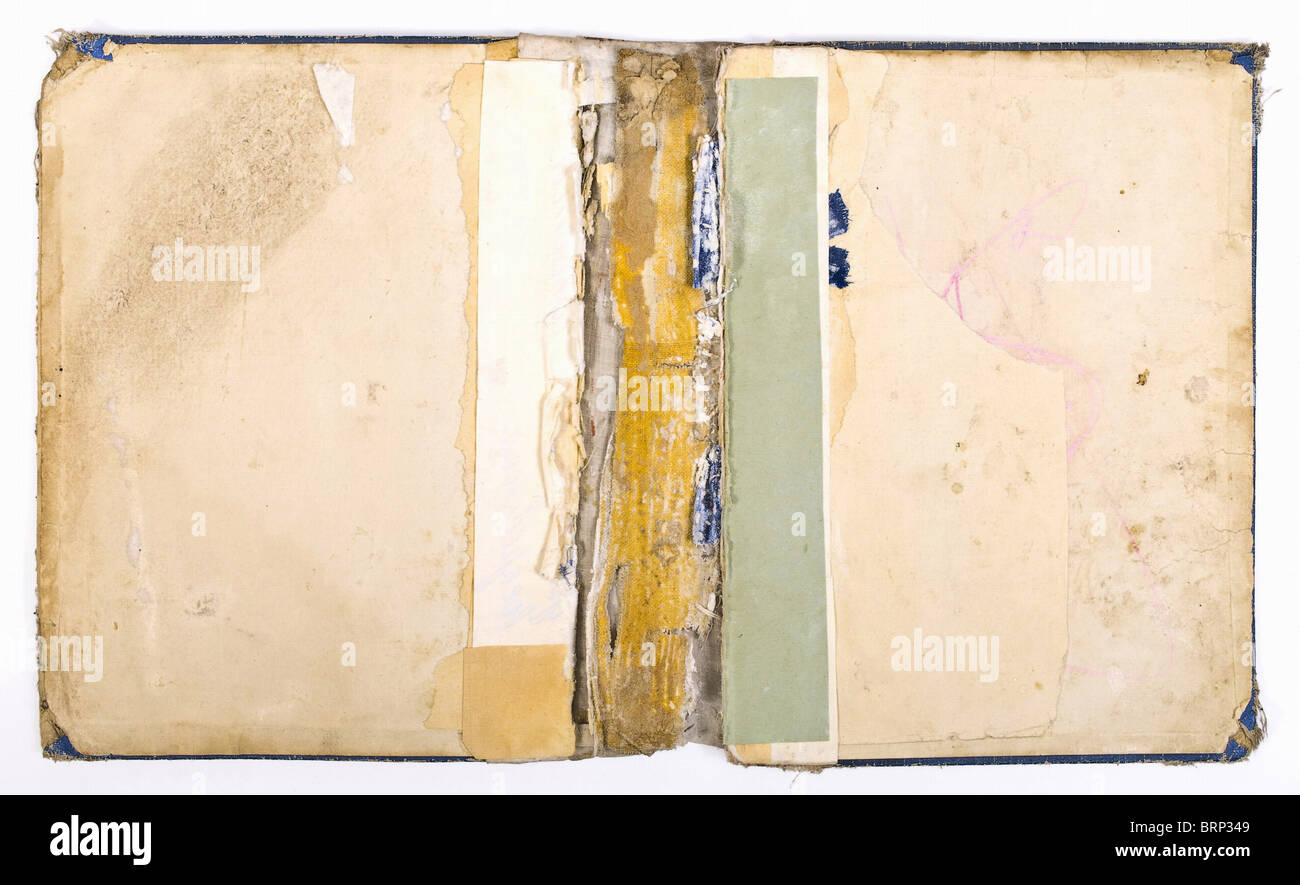 Ancient torn book Stock Photo - Alamy