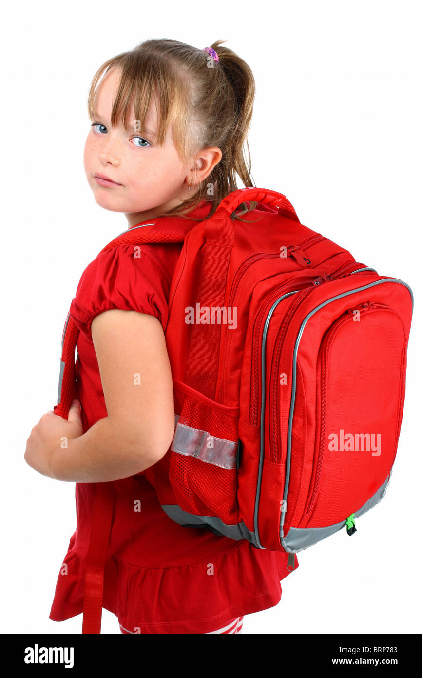Small girl with red school bag isolated on white Stock Photo - Alamy