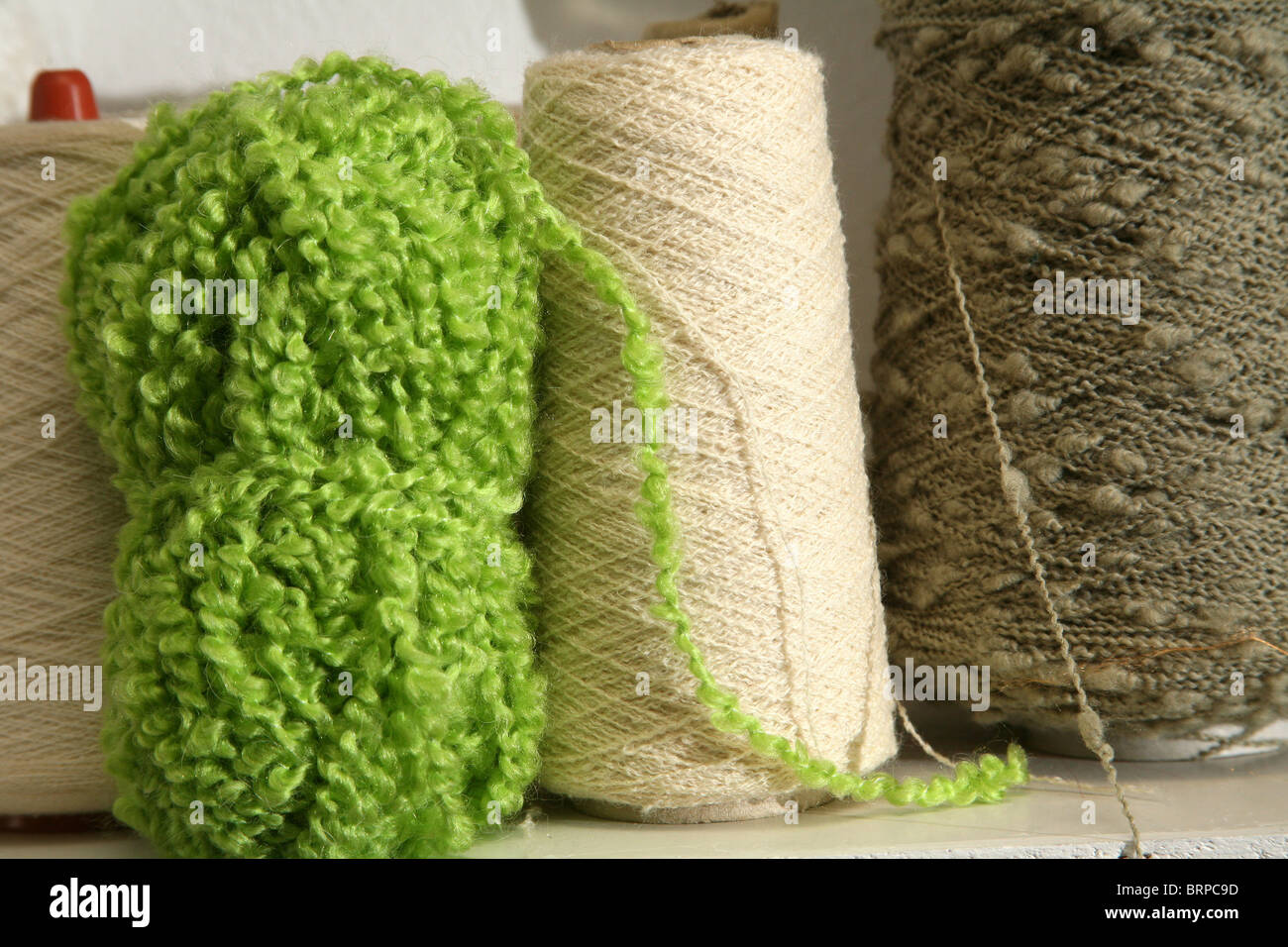Green woolen threads hi-res stock photography and images - Alamy