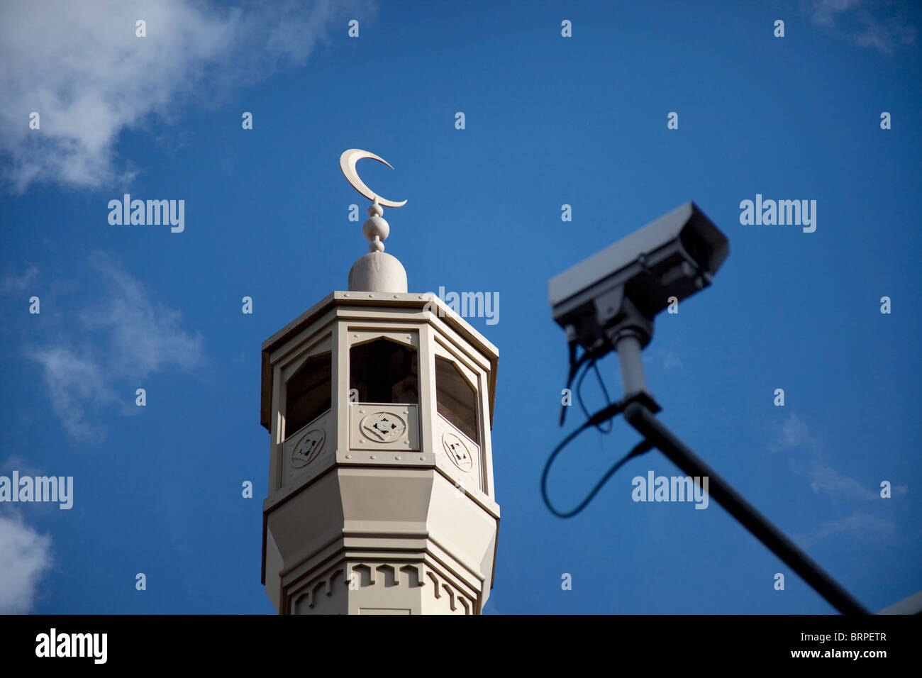 Minaret and a CCTV camera at the East London Mosque on Whitechapel High ...