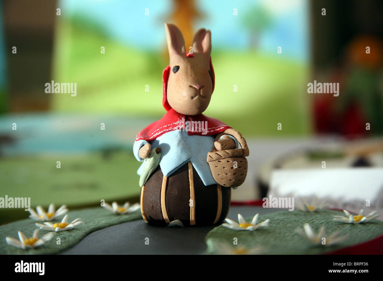 Sugar craft rabbit with shopping basket and sugar water lilies as cake ...