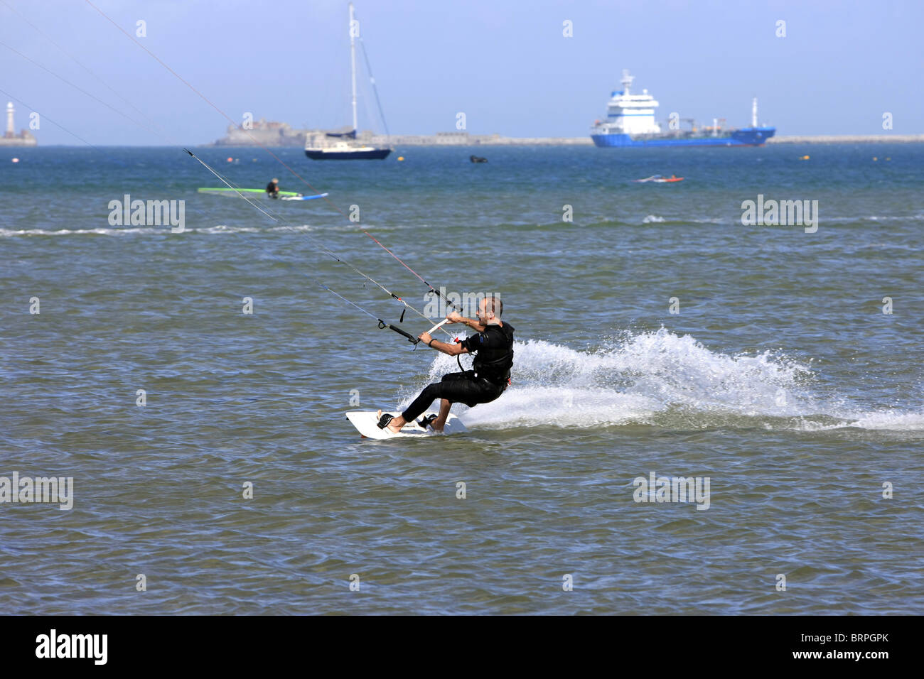 A man kite surfing in Portland Bay Dorset Stock Photo - Alamy