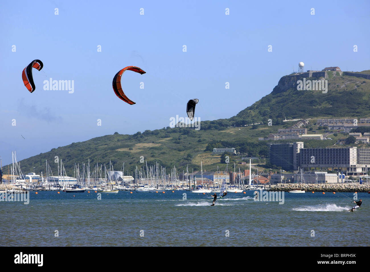 People kite surfing in Portland Bay Dorset Stock Photo - Alamy