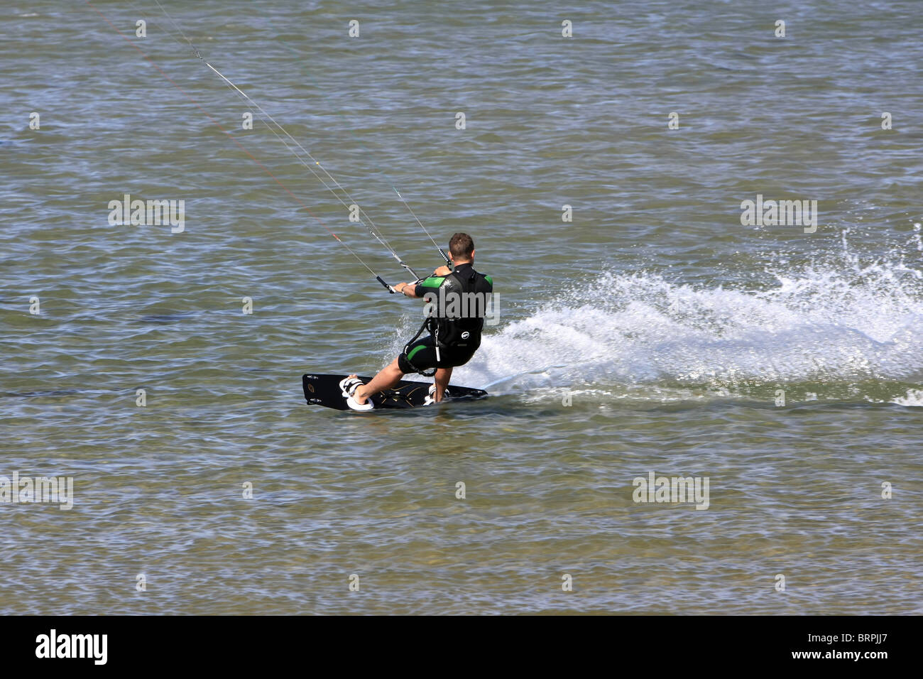 Man kite surfing in Portland Bay Dorset Stock Photo - Alamy