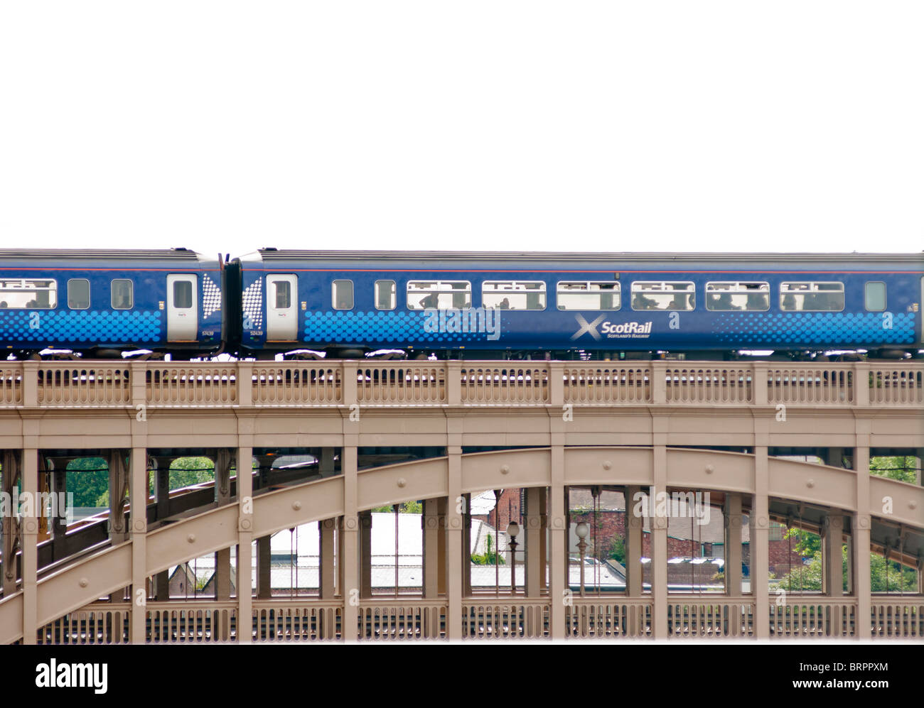 Scotrail train crossing the railway bridge on the Tyne river, Newcastle ...