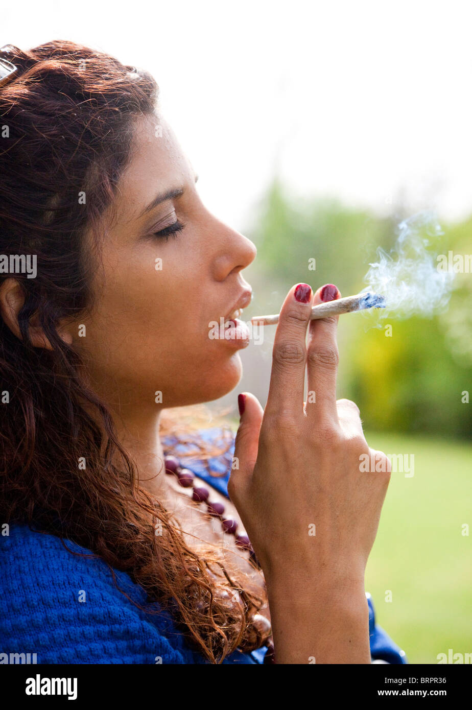 Young People Smoking Marijuana Relaxing High Resolution Stock ...