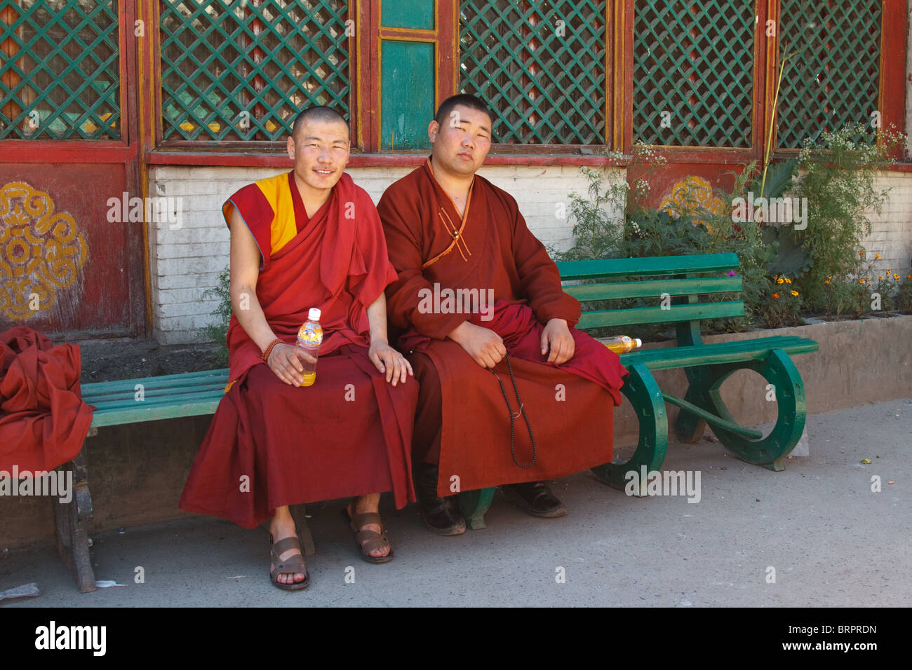 Two monks sitting on a bench in ulaanbaatar, Mongolia Stock Photo - Alamy