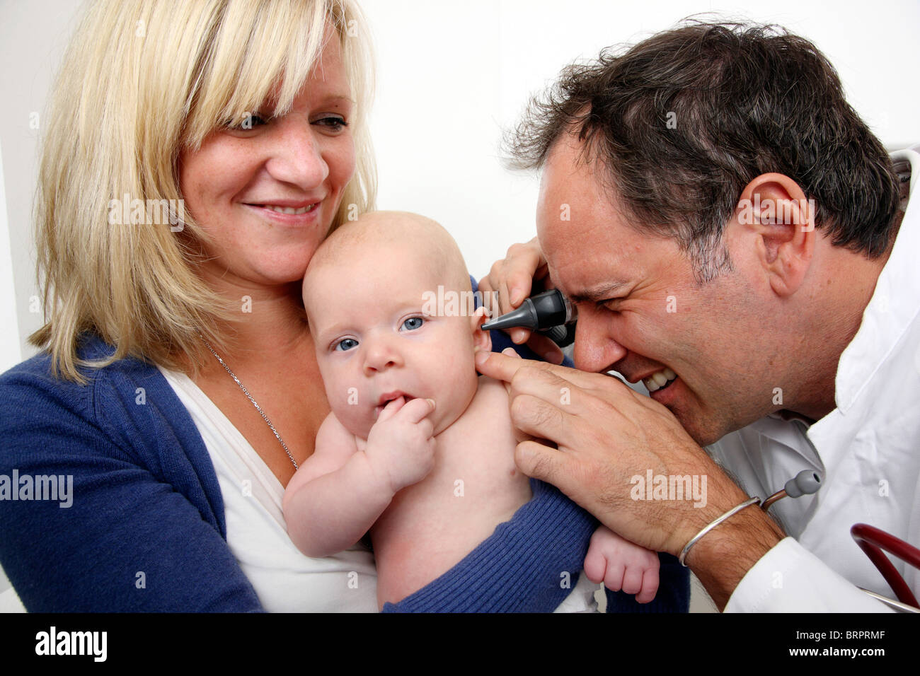 Doctor's surgery, paediatrician. Mother and baby. Medical examination ...