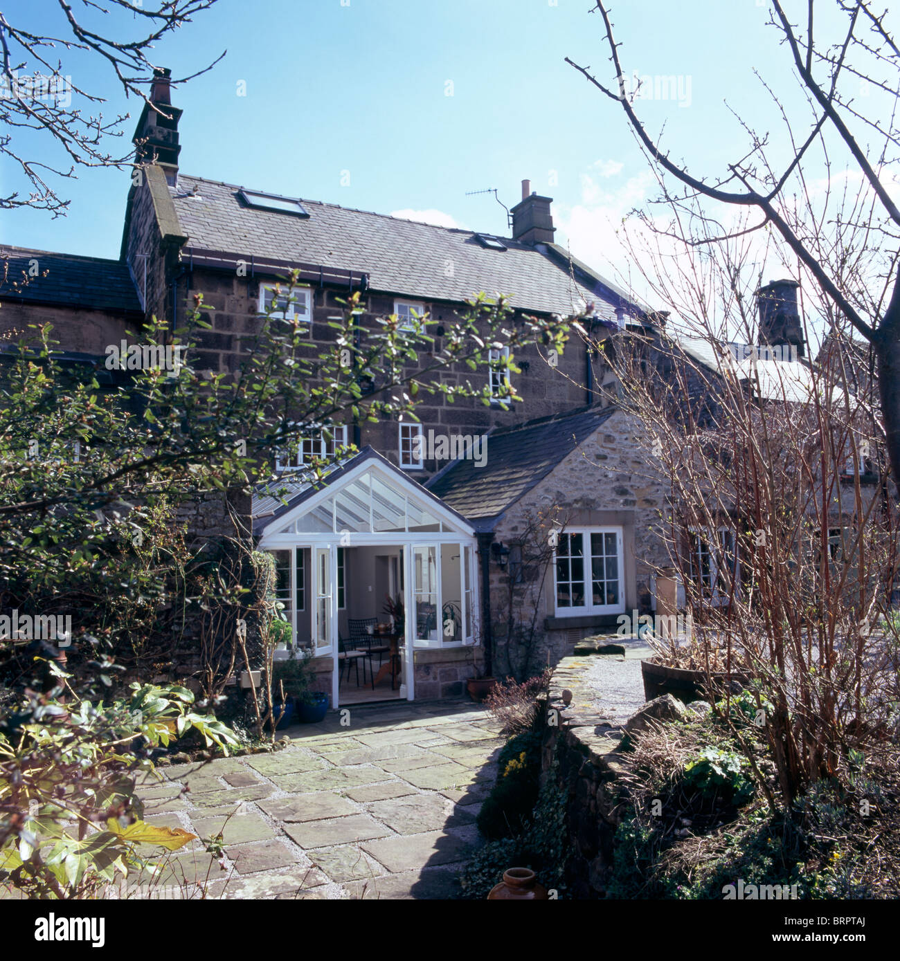 Small conservatory extension with apex roof on traditional country ...
