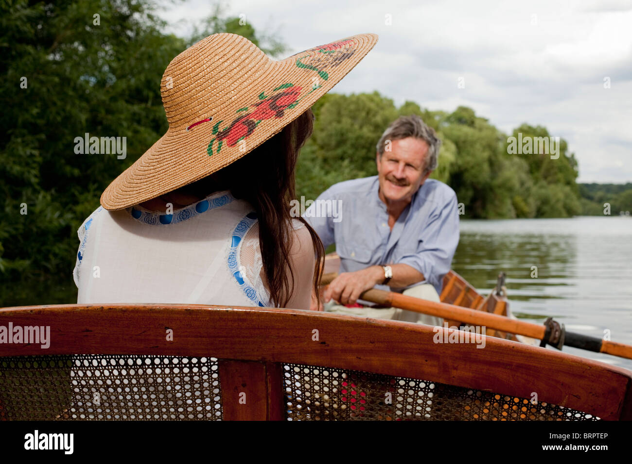 Father and daughter on a vintage boat Stock Photo - Alamy