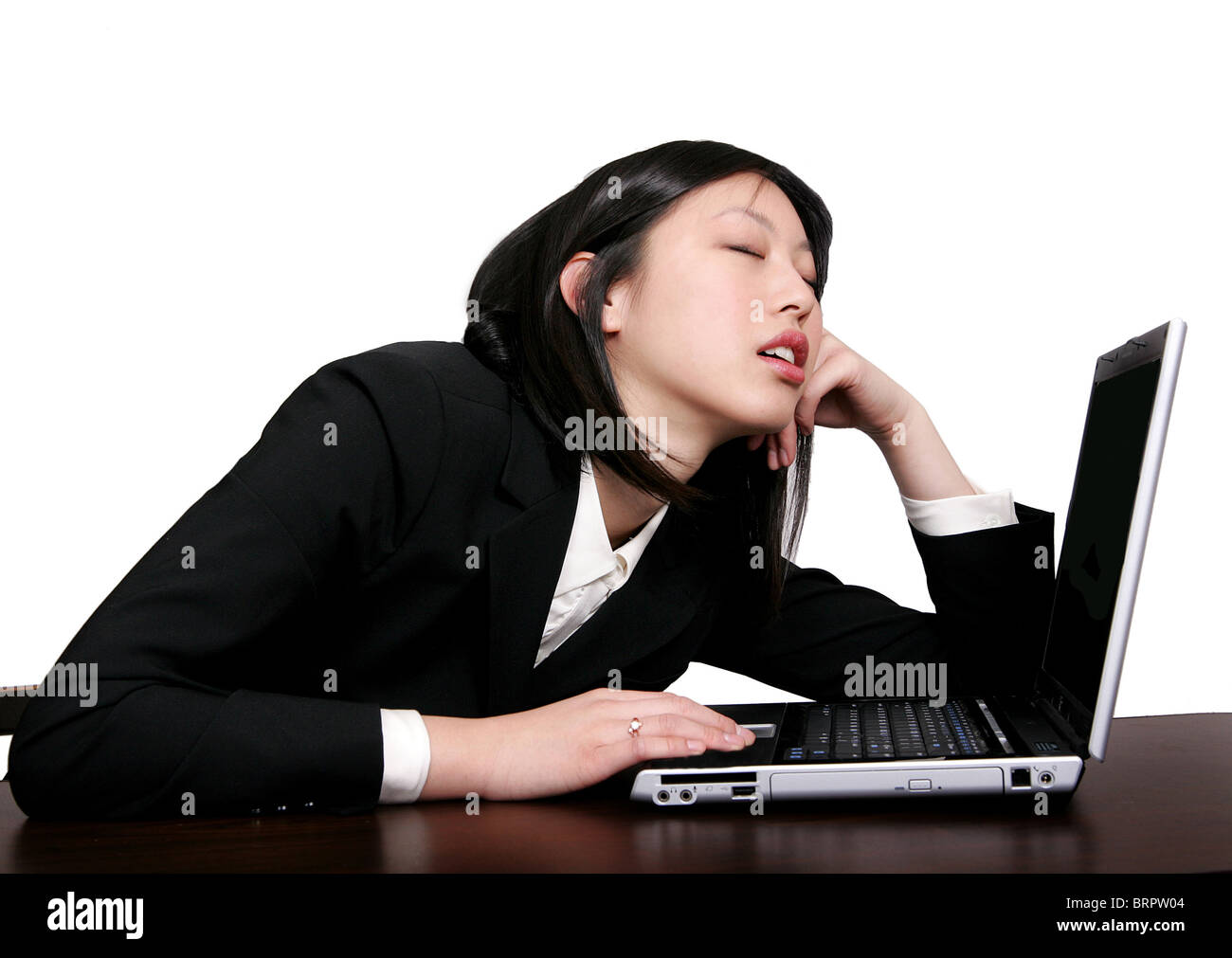 young businesswoman asleep at her computer Stock Photo - Alamy