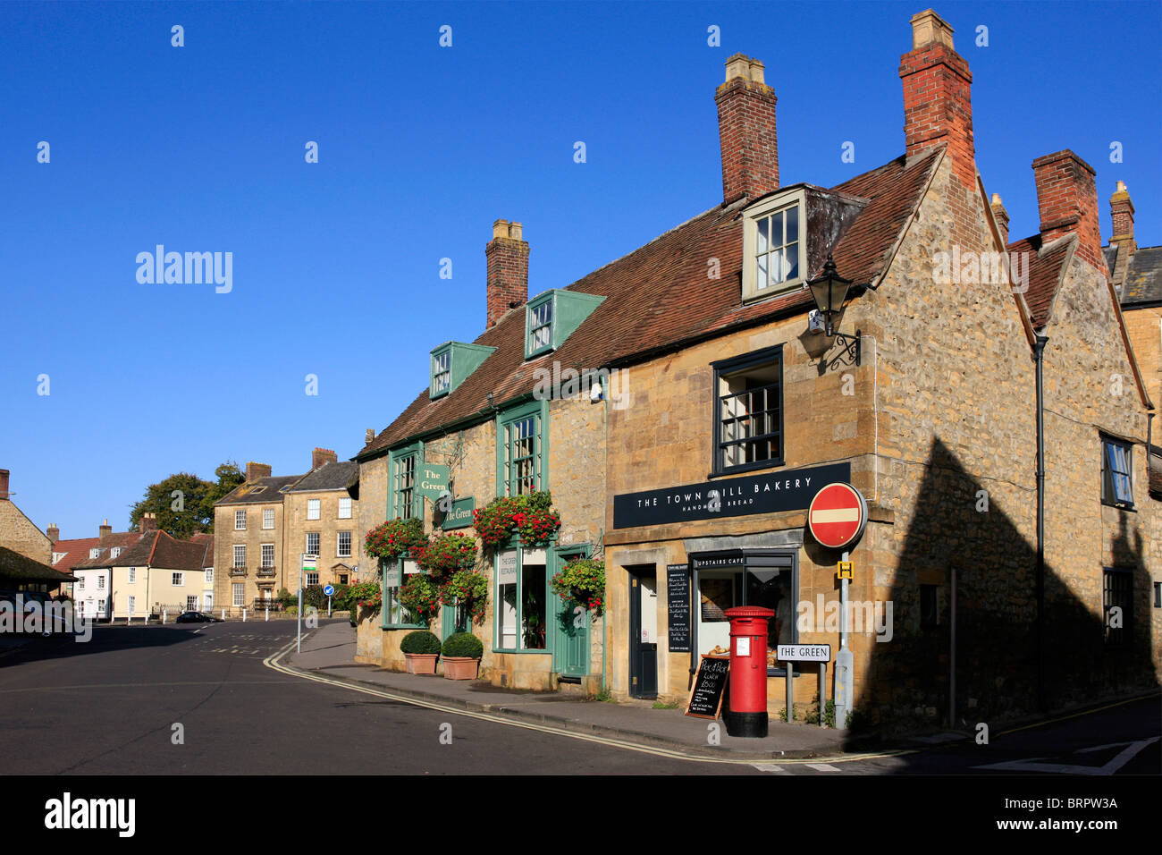 The Town Mill Bakery, The Green Tea Shop and traditional Red Royal Mail ...