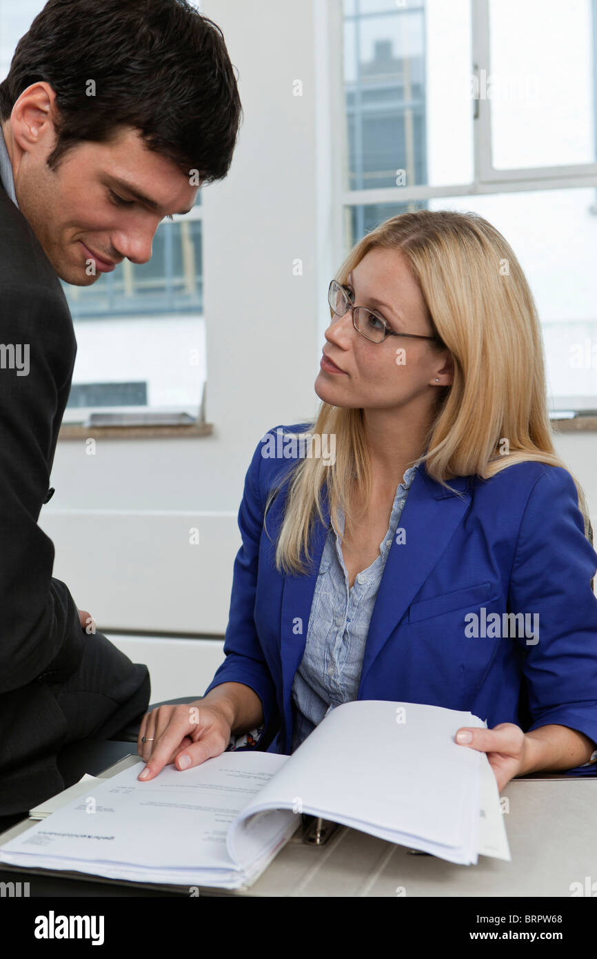 Reviewing a client prospect Stock Photo - Alamy