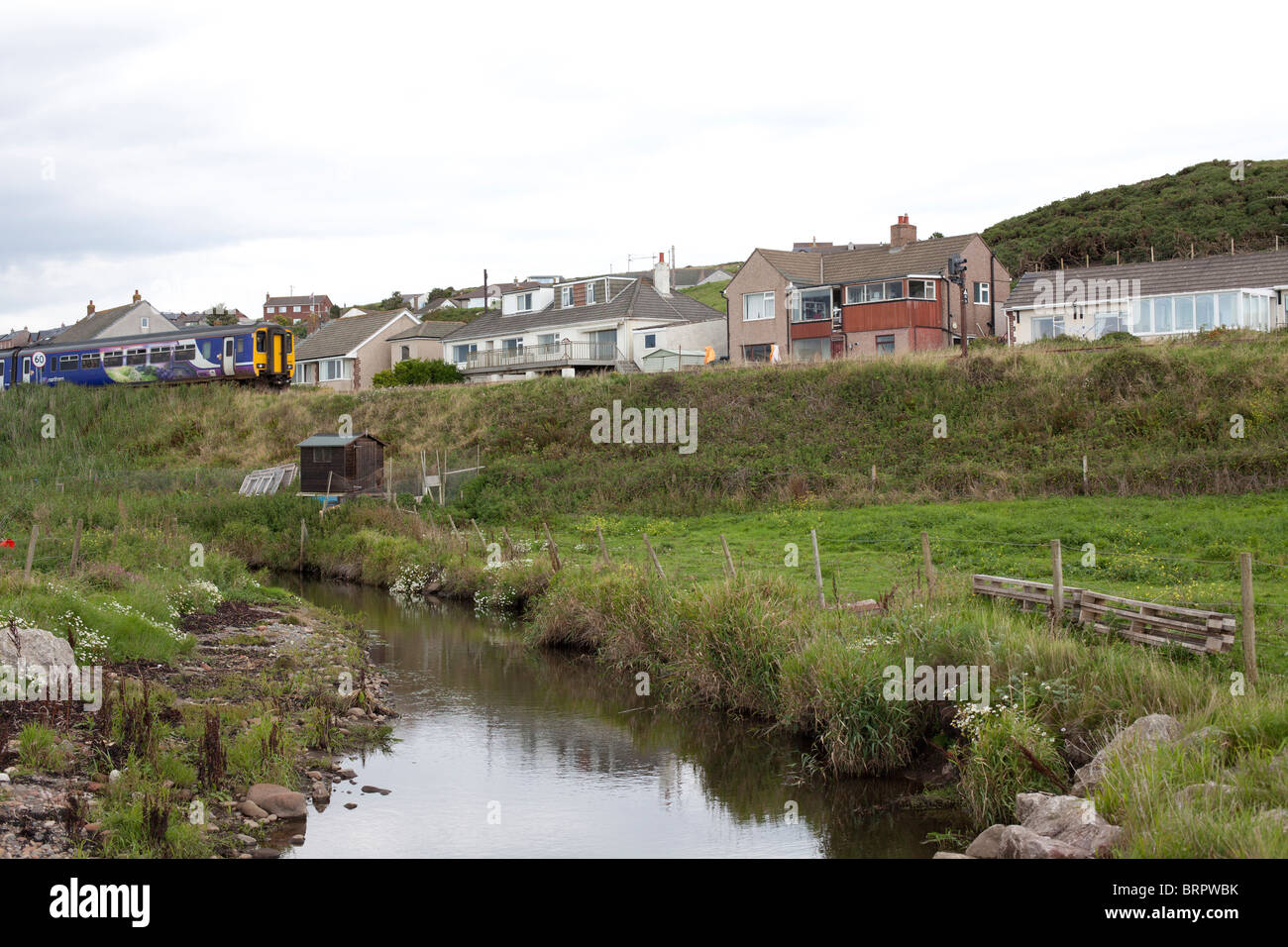 Train on the Cumbrian coast line at St Bees, Cumbria Stock Photo - Alamy