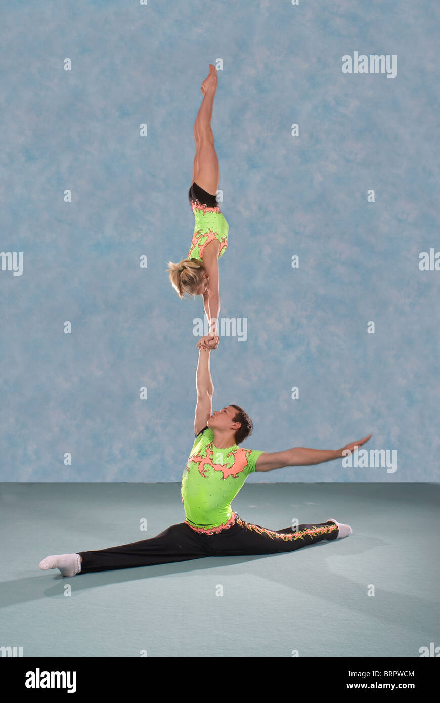 Acrobatic troop performing moves Stock Photo - Alamy