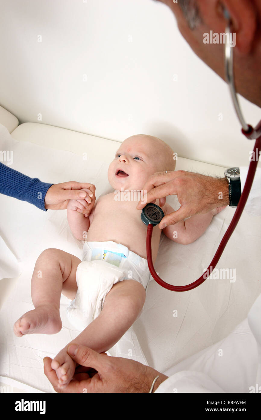 Doctor's surgery, paediatrician. Mother and baby. Medical examination ...