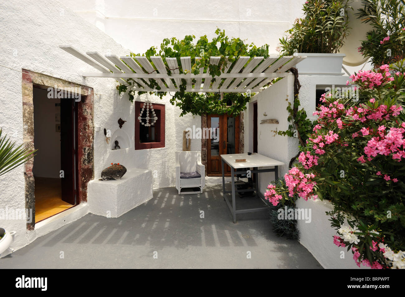 Brightly colored house on the Greek island of Santorini Stock Photo - Alamy