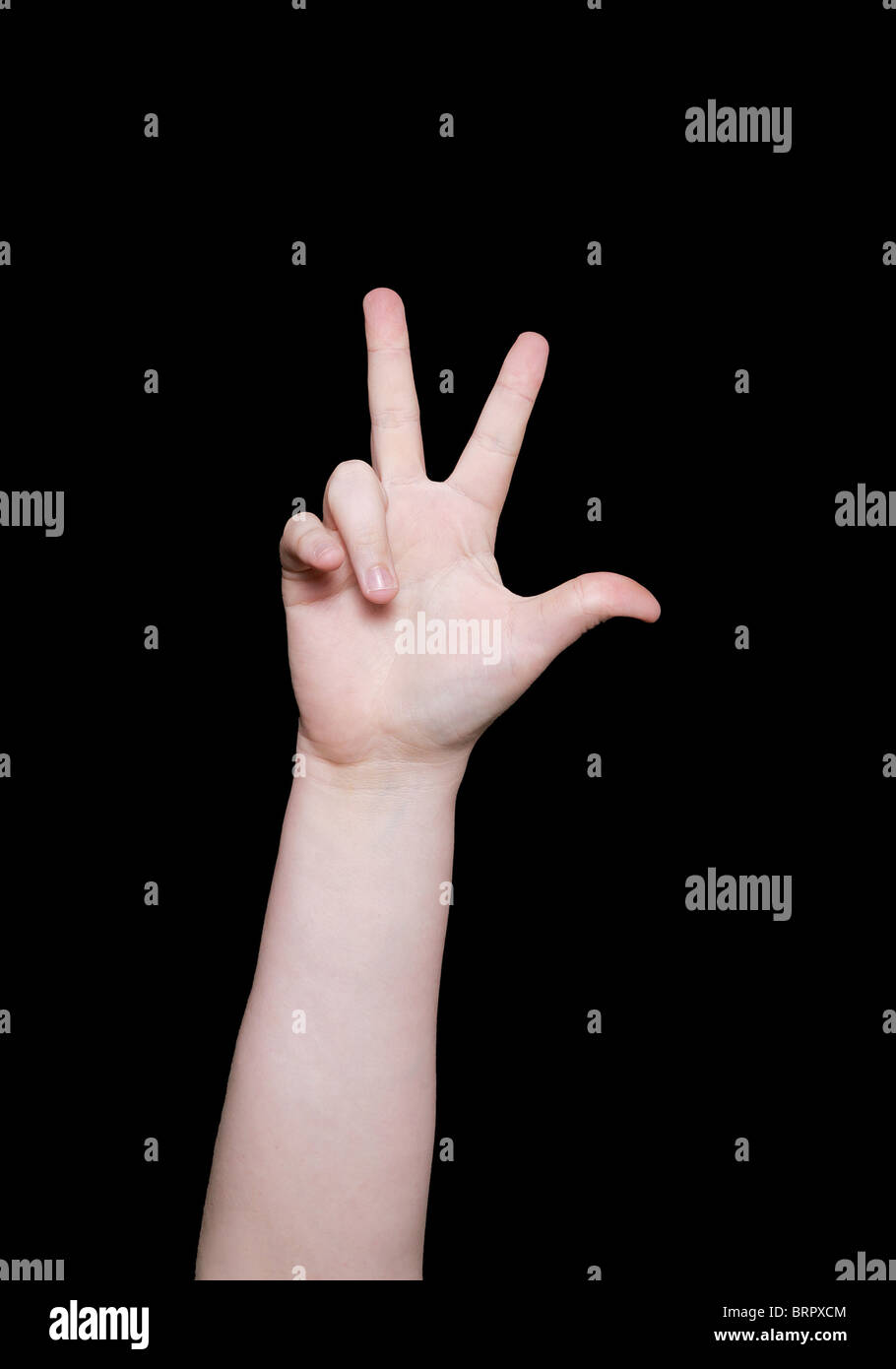 the number three in sign language on a black background Stock Photo - Alamy